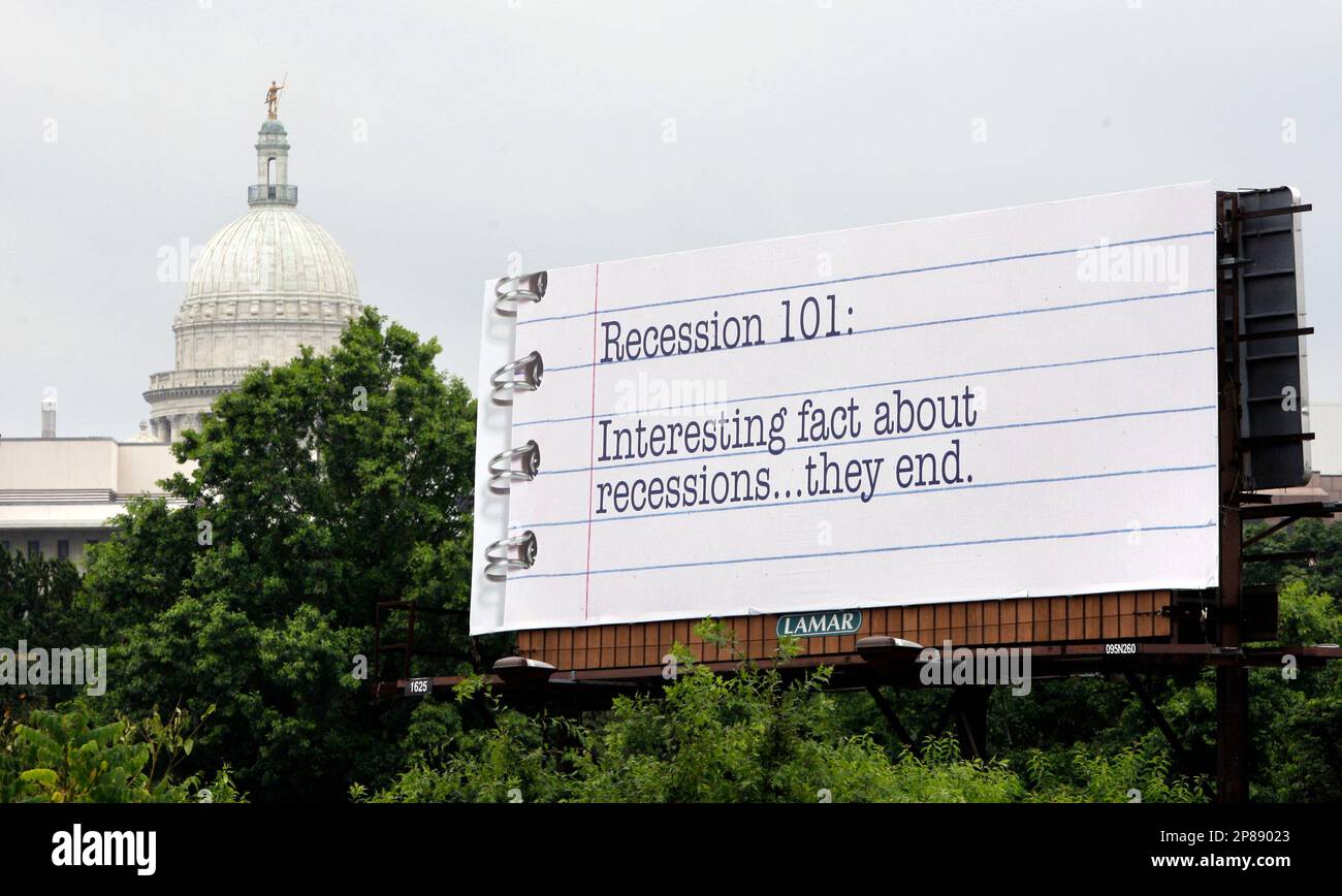 A billboard appears along Interstate 95, with the statehouse at left ...
