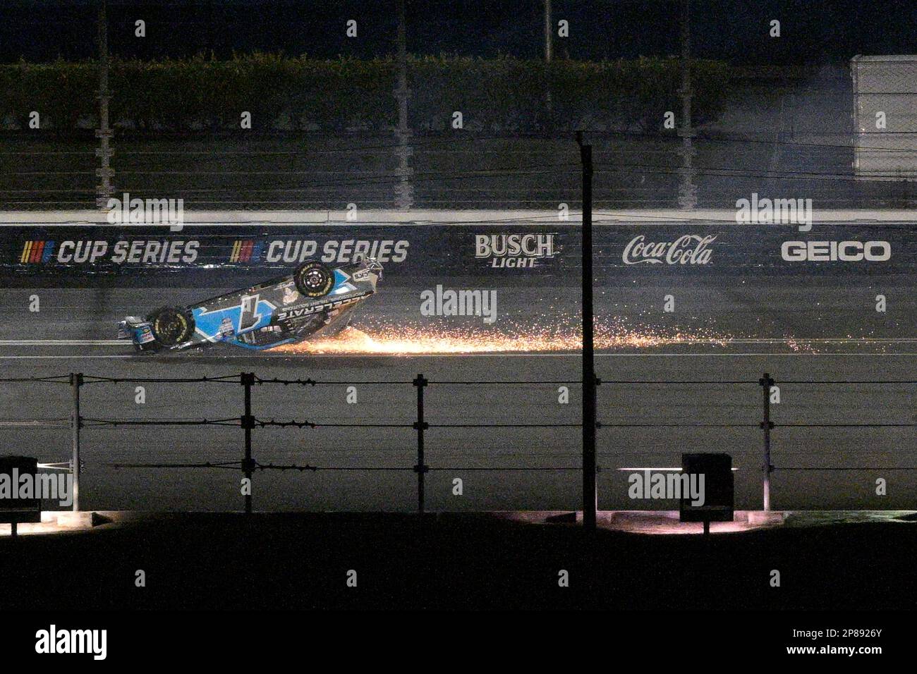 Sam Mayer's car skids on its roof after wrecking on the back stretch ...