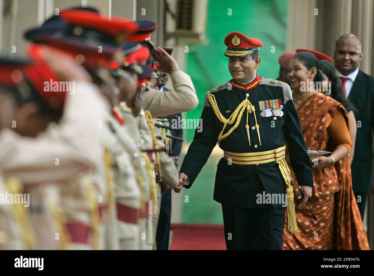 Sri Lankan army commander Lt. Gen. Jagath Jayasuriya, right front ...