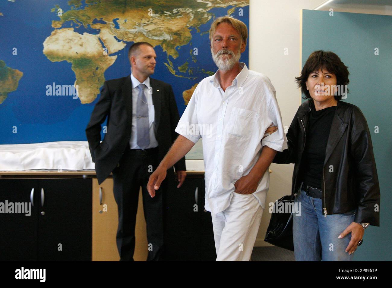 Werner Greiner, left, a Swiss citizen who had been held hostage in Mali since January 2009 ...