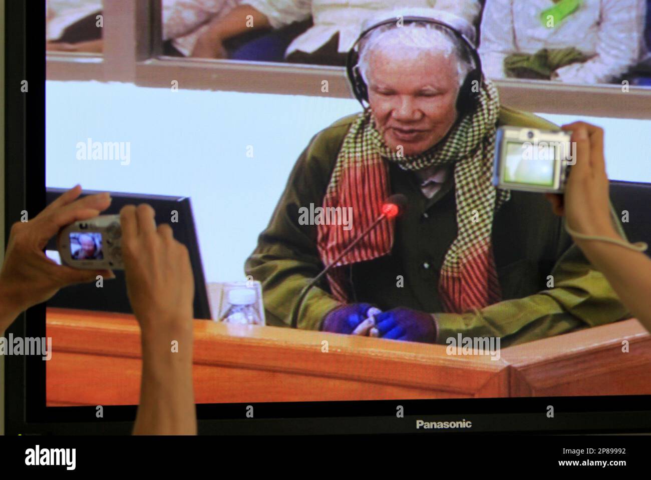 Photographers take picture of Mam Nai, a former Khmer Rouge Chief of ...
