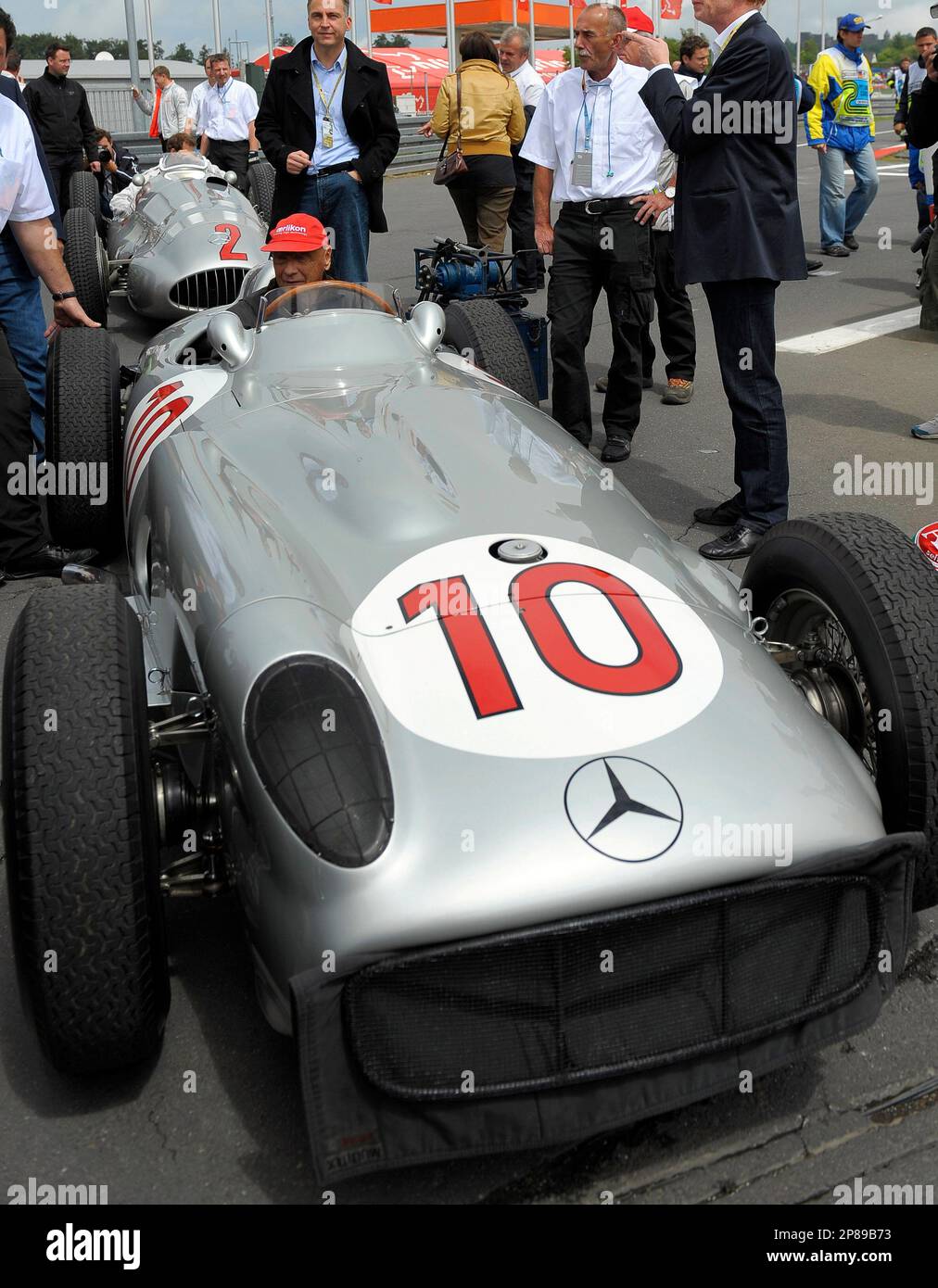 Former Formula One world champion Nicki Lauda of Austria sits in a ...