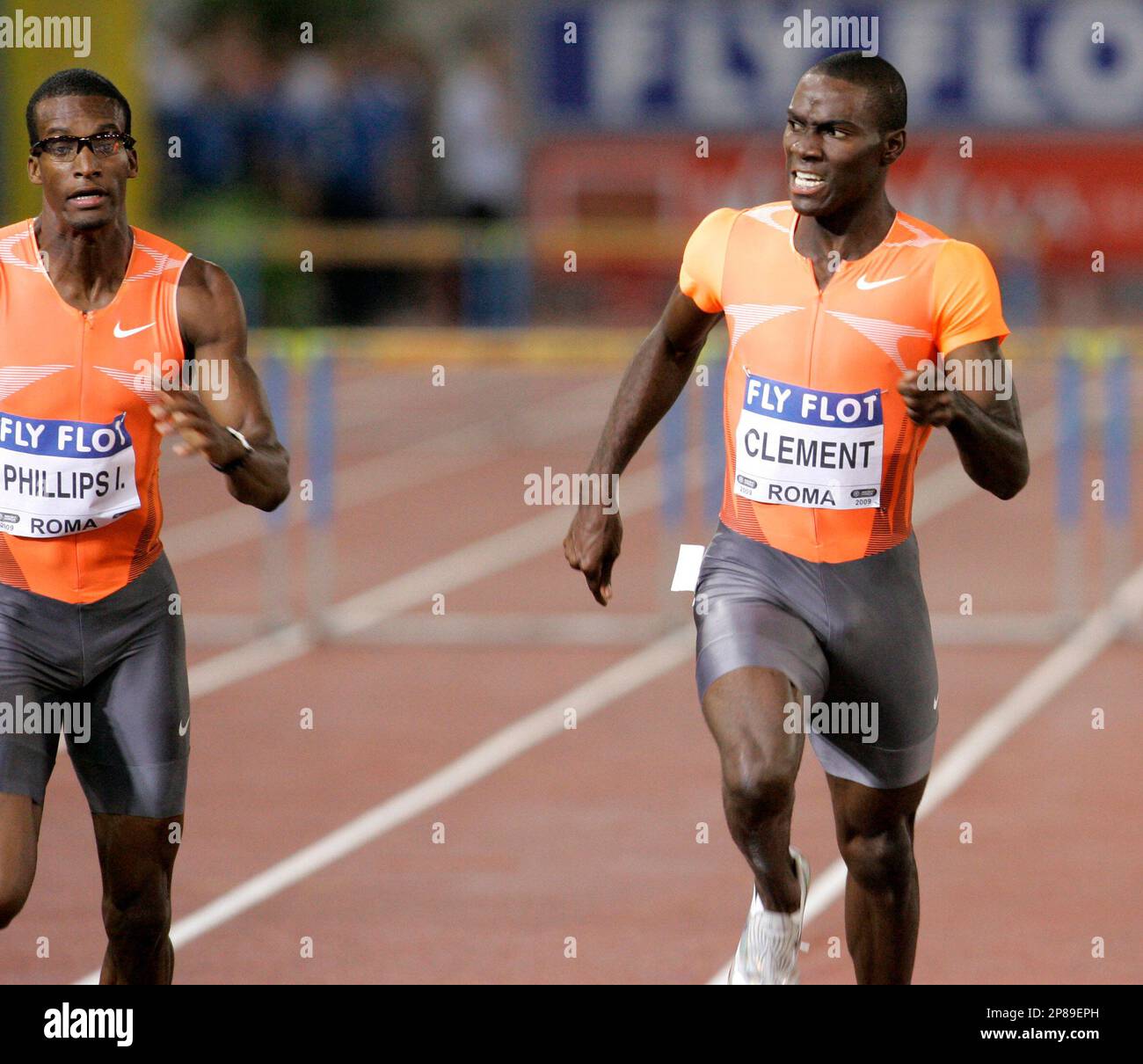 Kerron Clement of United States, right, wins ahead of Isa Philips from ...