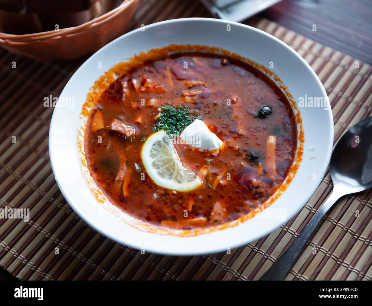 Russian cuisine - solyanka soup with ingredients Stock Photo - Alamy