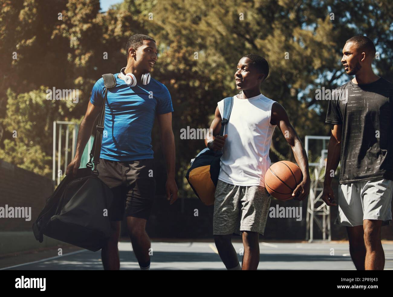 Basketball, team and sports friends walking relax after game ...