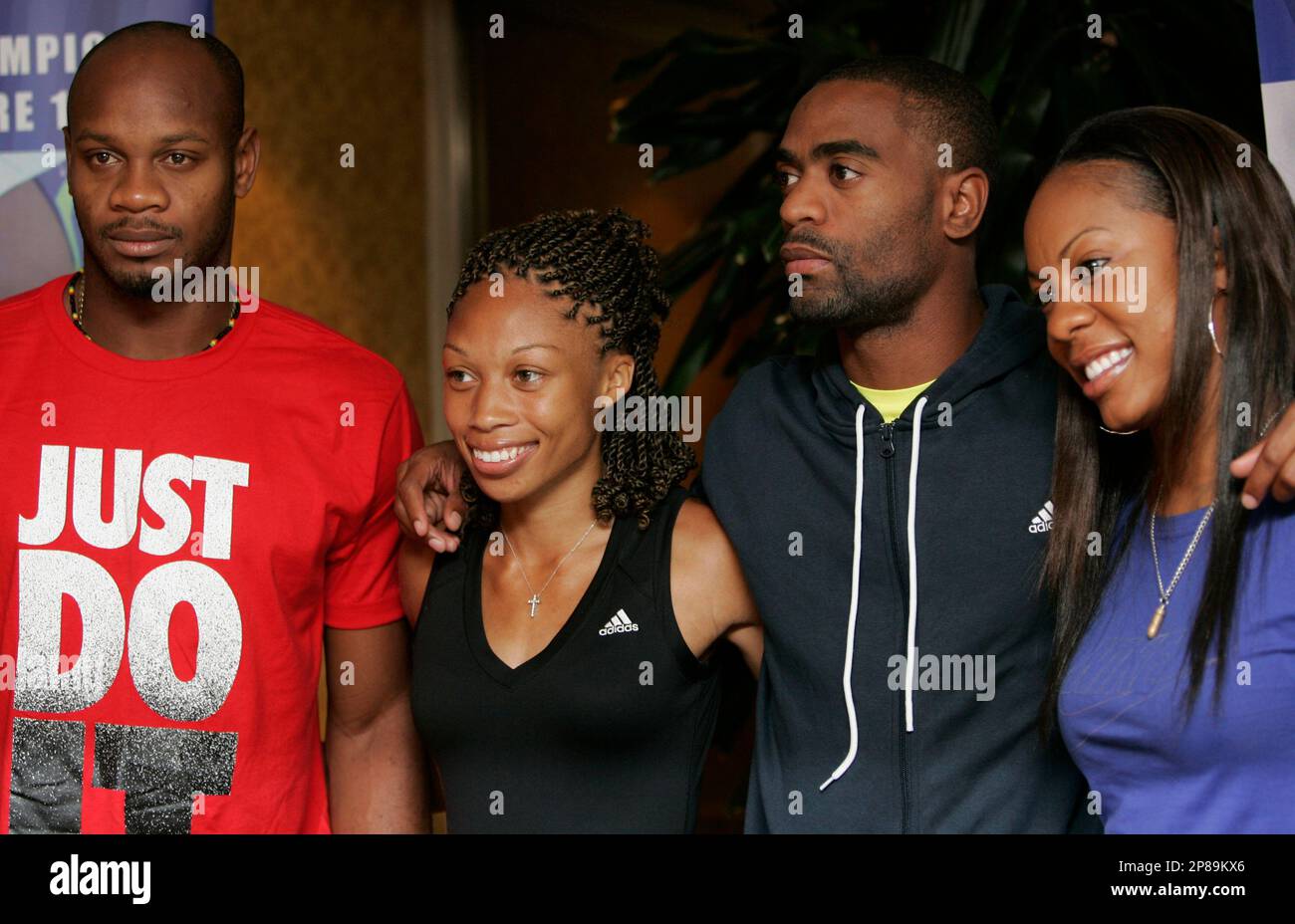 From left, runners Jamaica's Asafa Powell, US' Allyson Felix ...