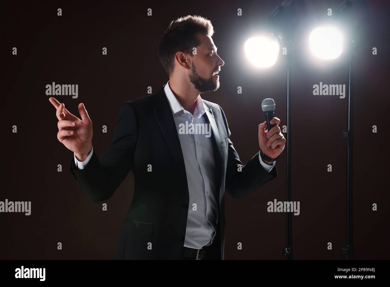 Motivational speaker microphone performing hi-res stock photography and ...