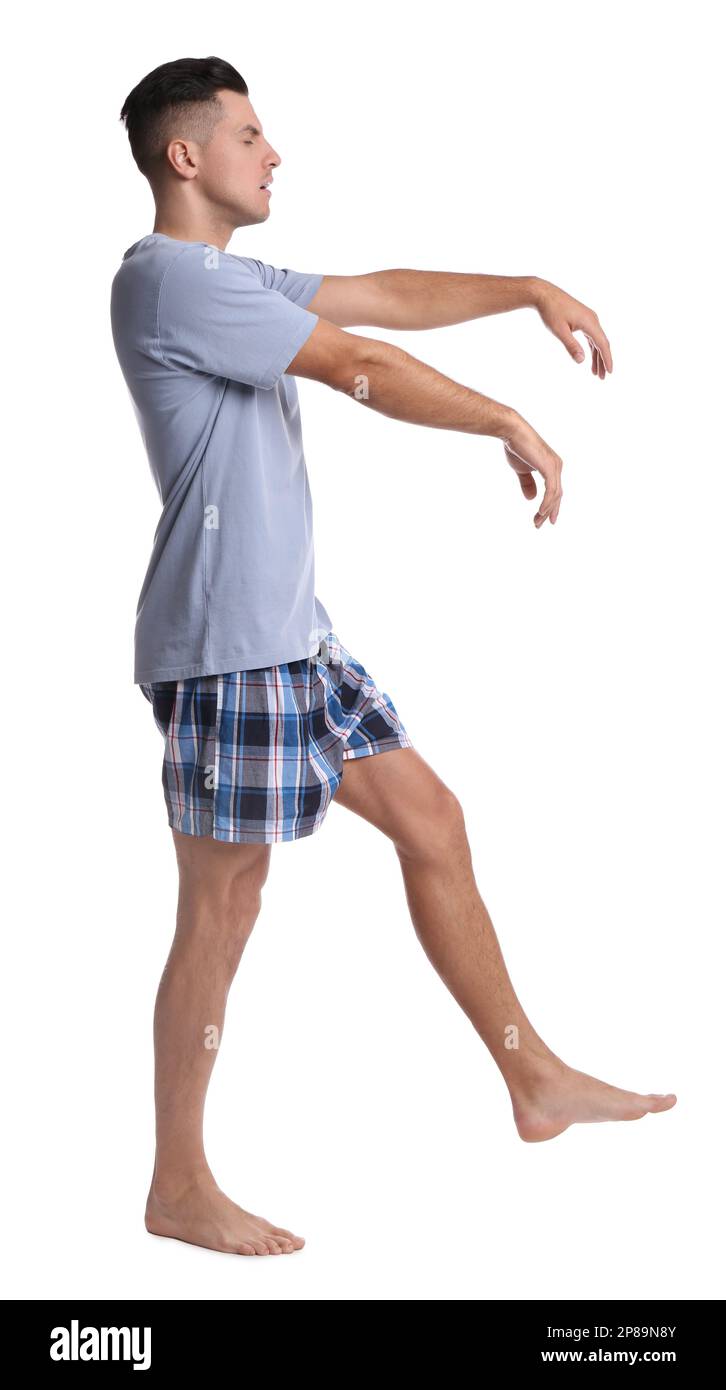 Somnambulist in pajamas on white background. Sleepwalking Stock Photo ...