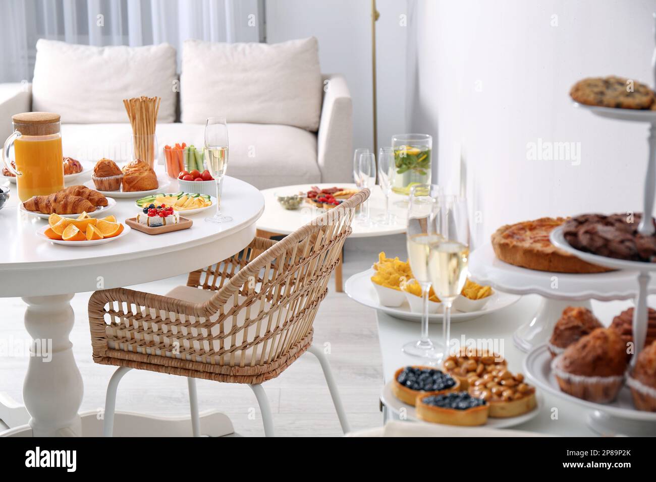 Variety of snacks served on tables indoors in buffet style Stock Photo ...