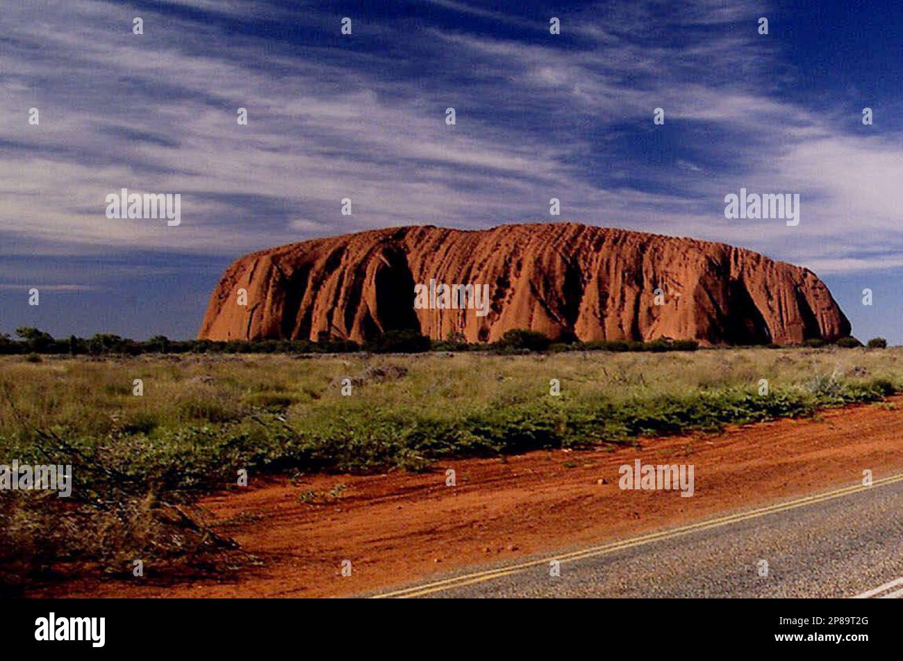 FILE - In this June 8, 2000 file photo shown is Uluru, or Ayers Rock ...