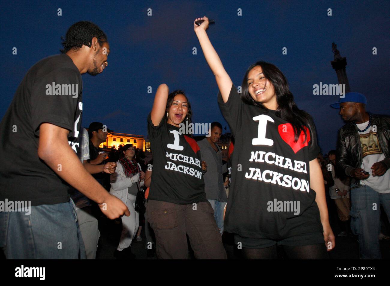 Fans of Michael Jackson dance in celebration to his music at Trafalgar ...