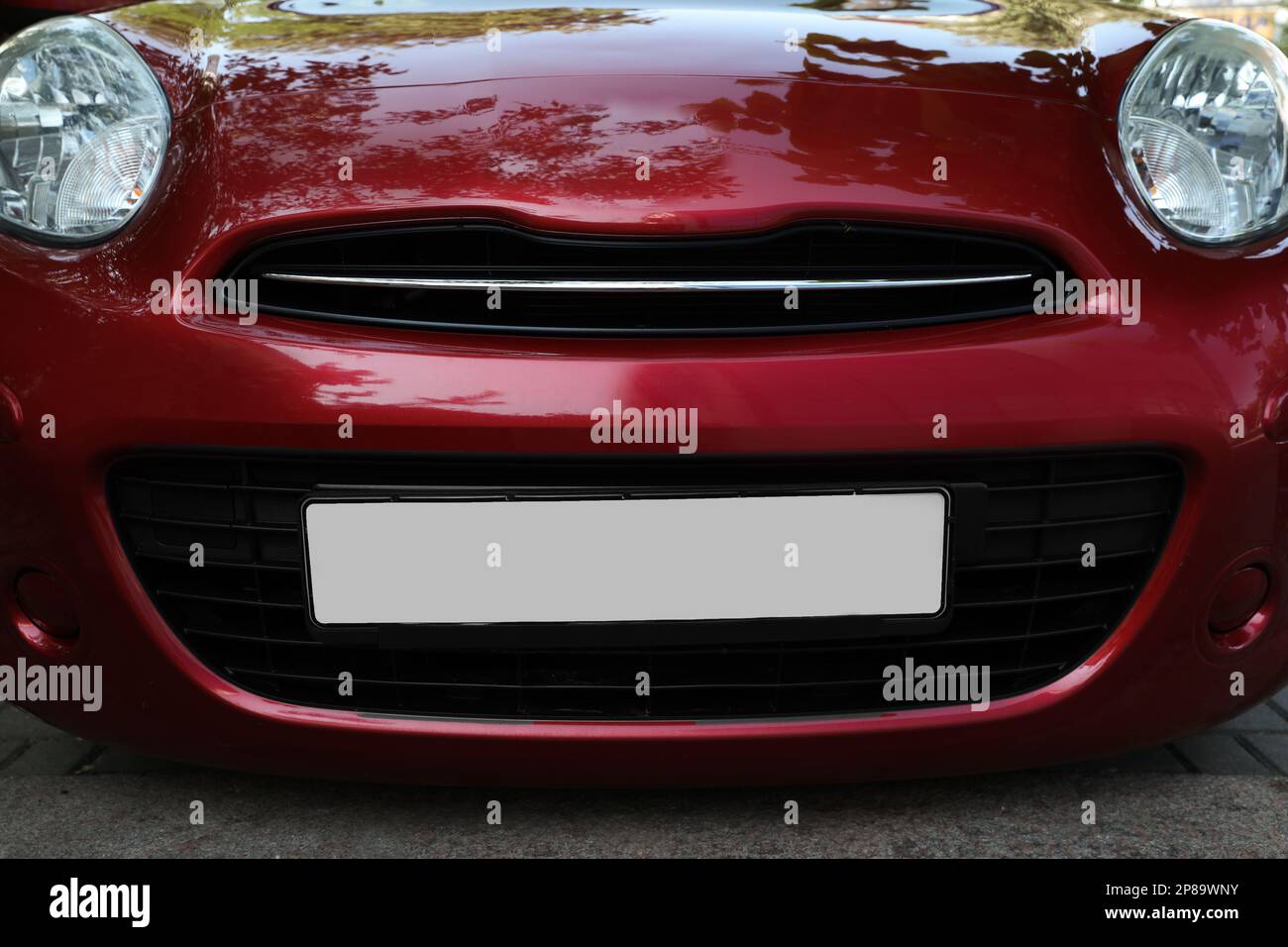 Car with vehicle registration plate outdoors, closeup Stock Photo - Alamy
