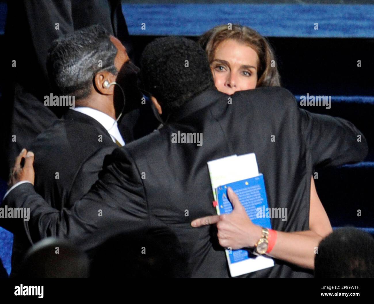 Actress Brooke Shields hugs members of the Jackson family after ...