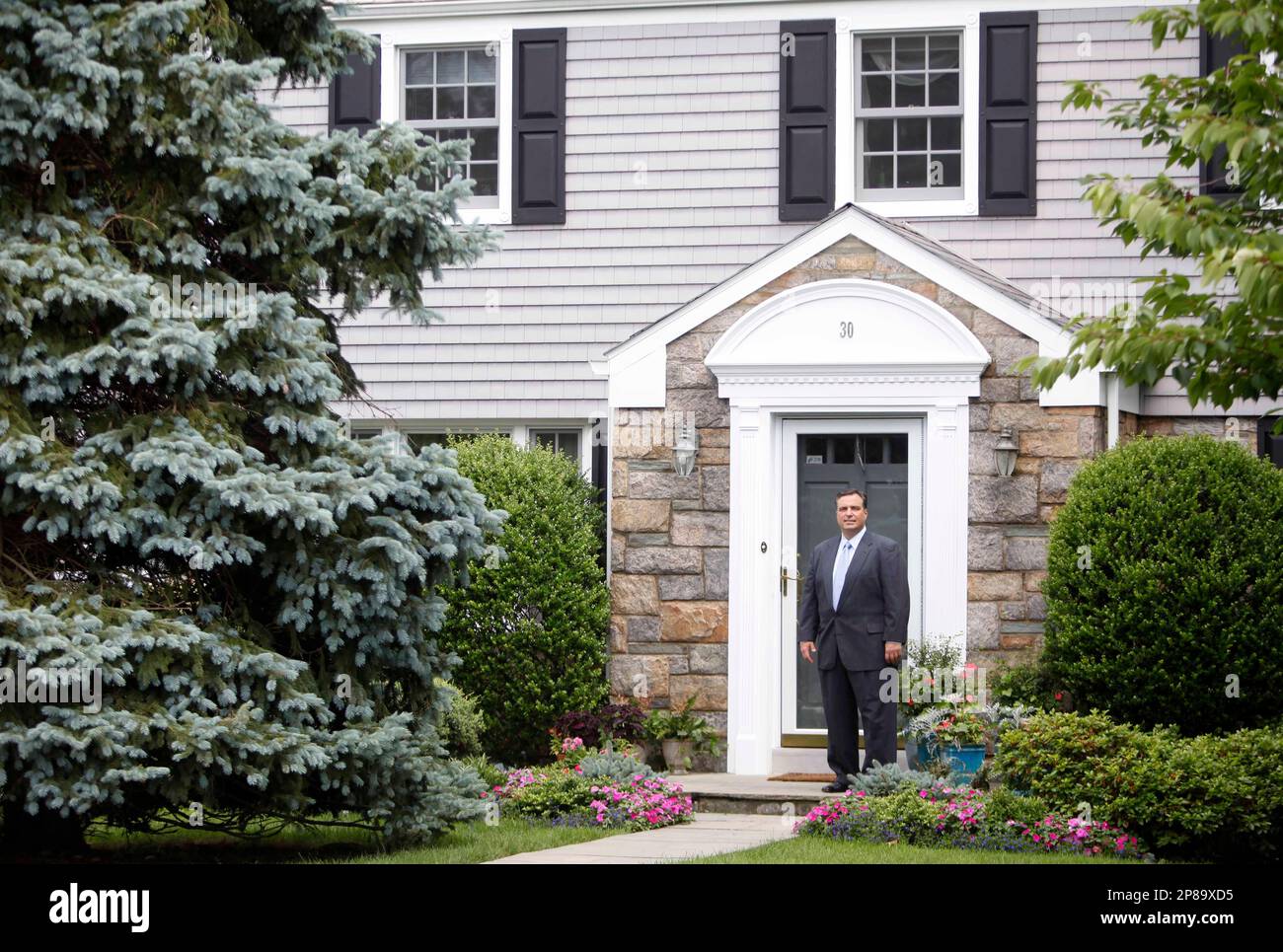 In this July 1, 2009 photo, homeowner Larry Brocchini poses for a ...