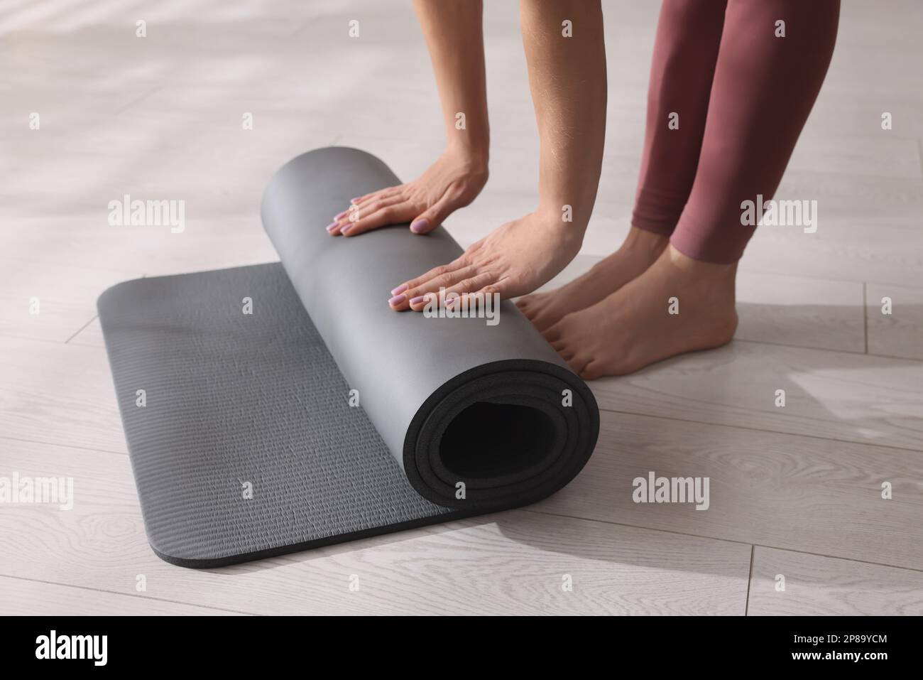 Unrolling mat hi-res stock photography and images - Alamy