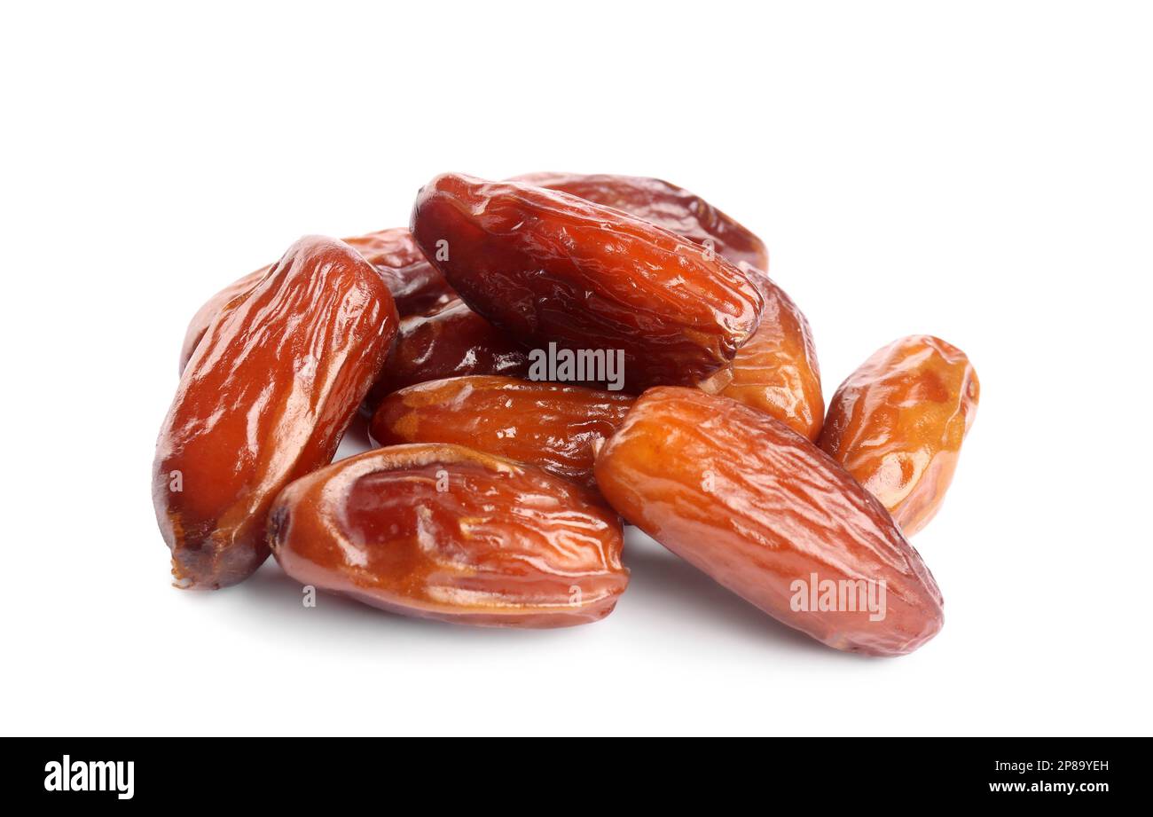 Heap of tasty sweet dried dates on white background Stock Photo - Alamy