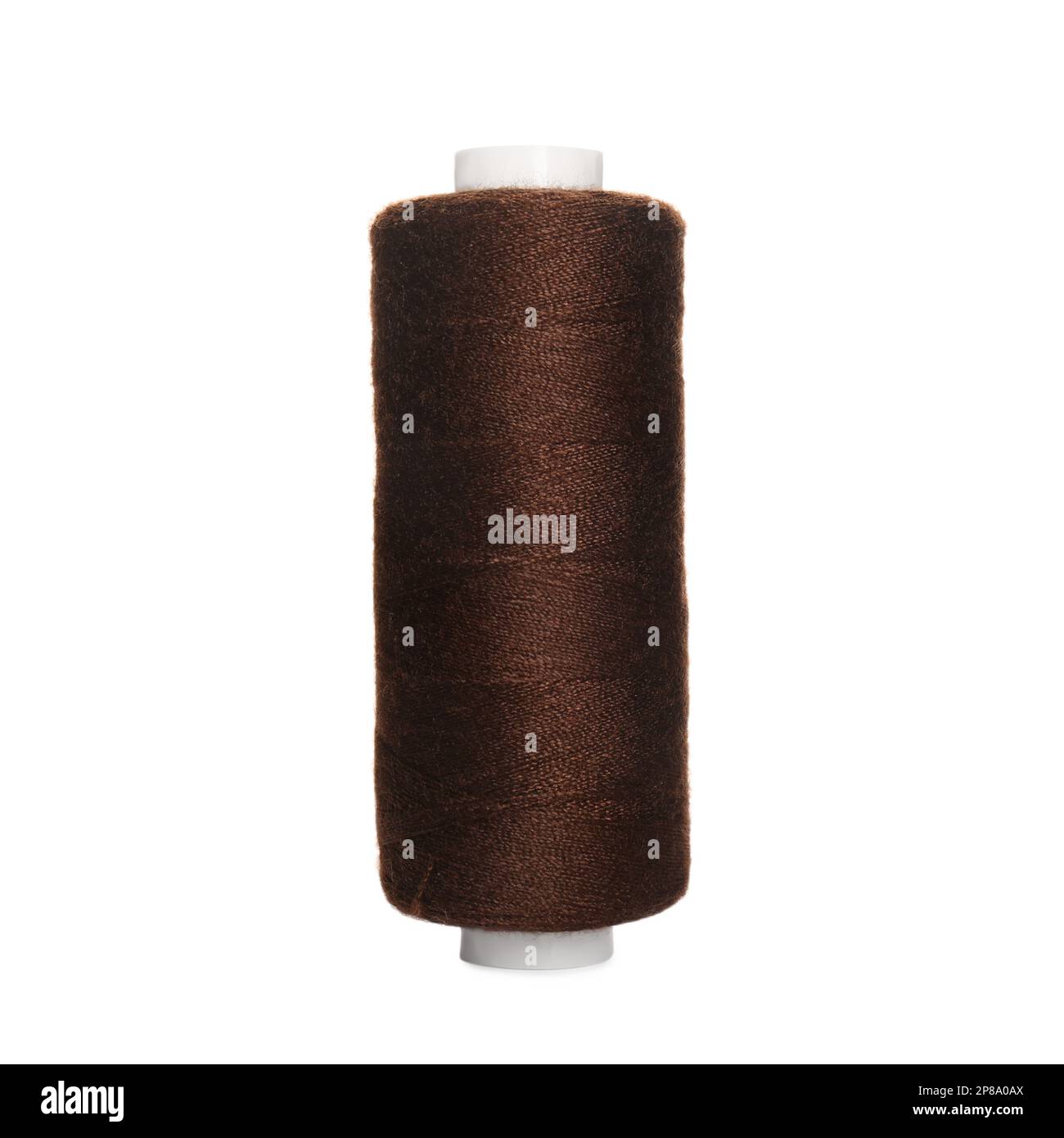 Spool of brown sewing thread isolated on white Stock Photo - Alamy