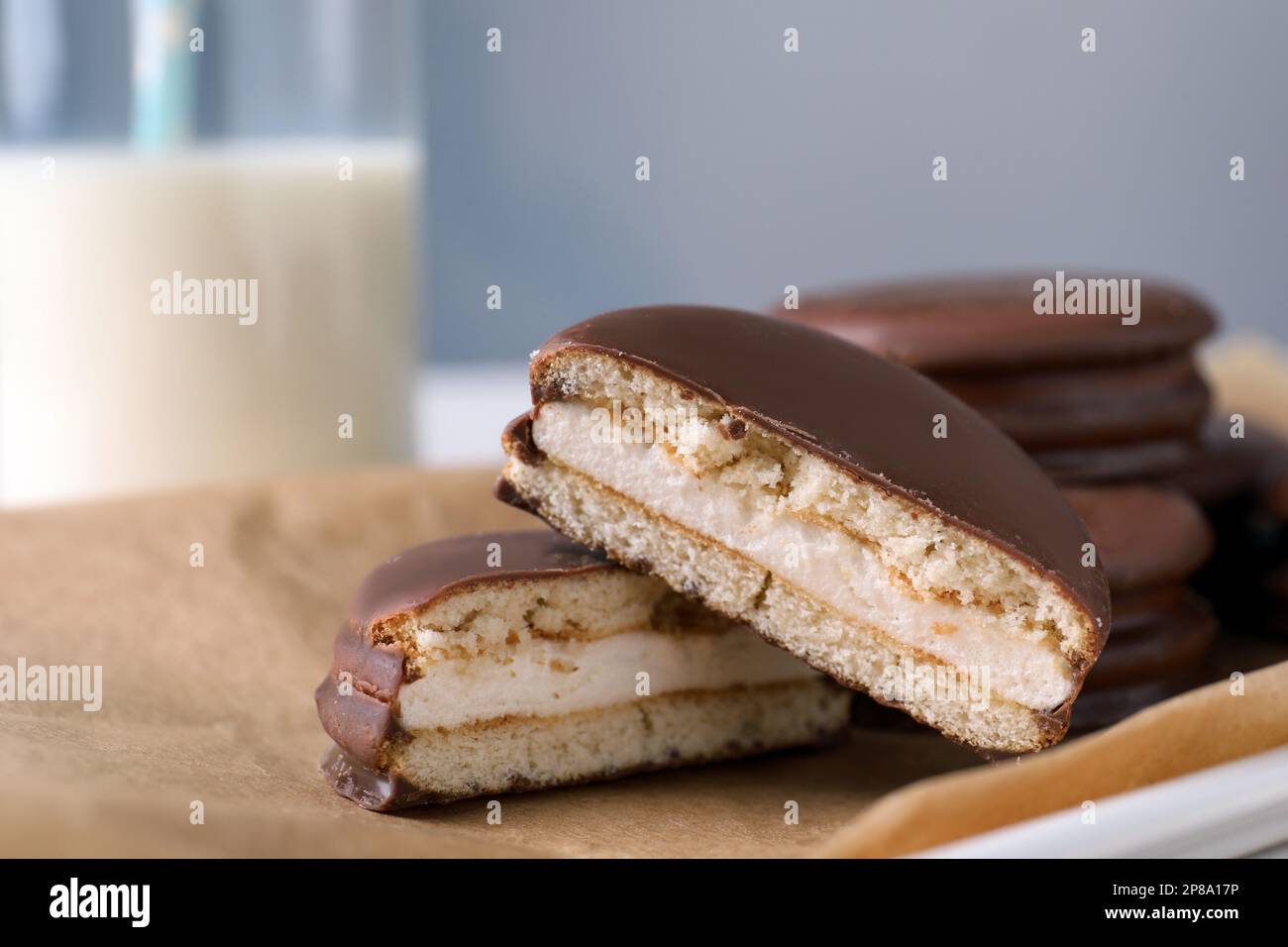 Tasty choco pies on parchment paper, closeup view Stock Photo - Alamy