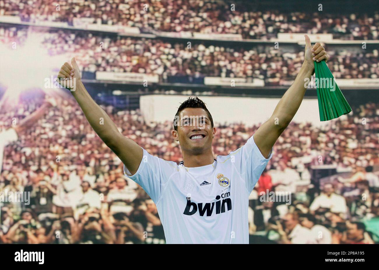 Real Madrid's new soccer player Cristiano Ronaldo from Portugal waves ...