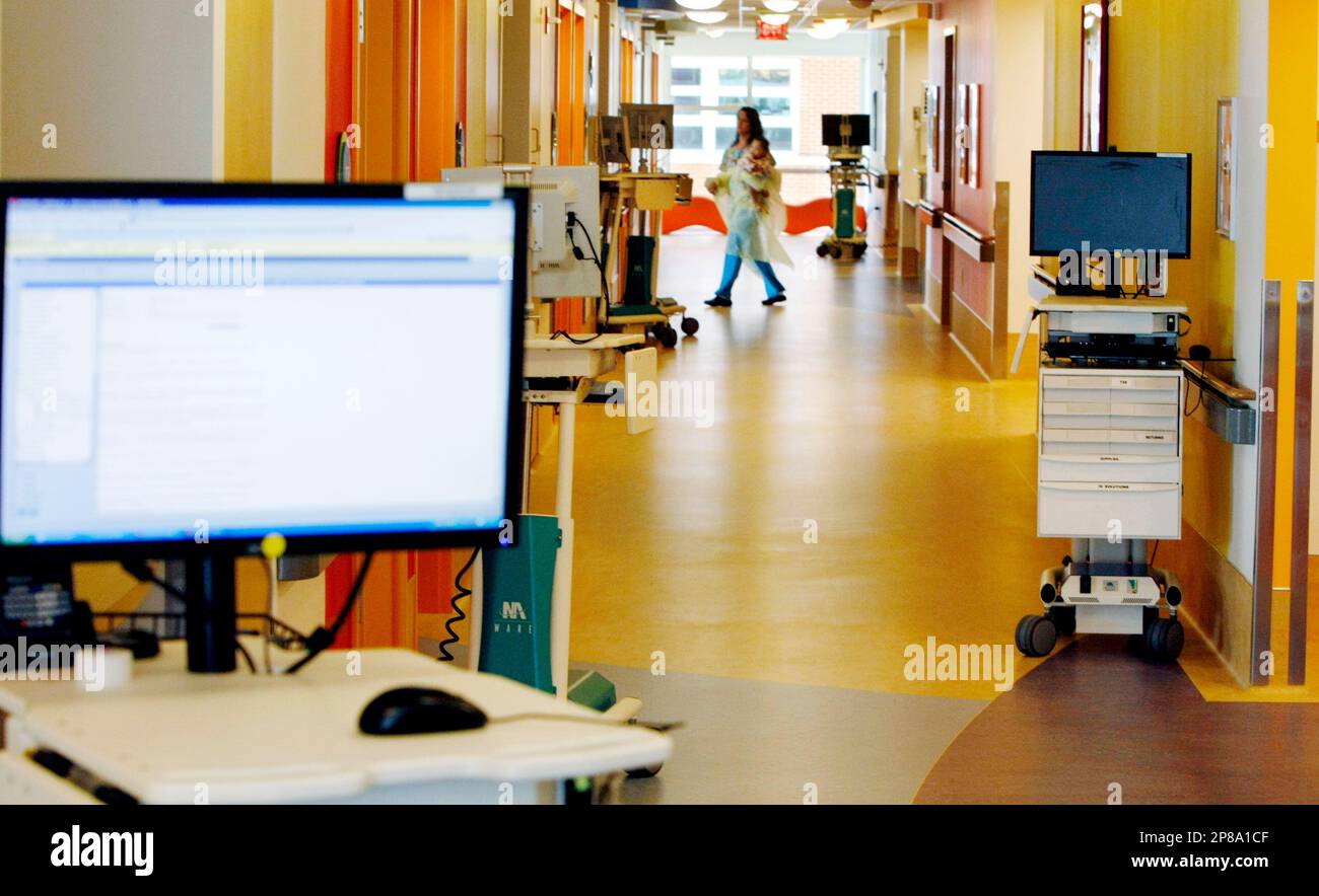 In this photo taken Wednesday, June 24, 2009, computers on wheels ...