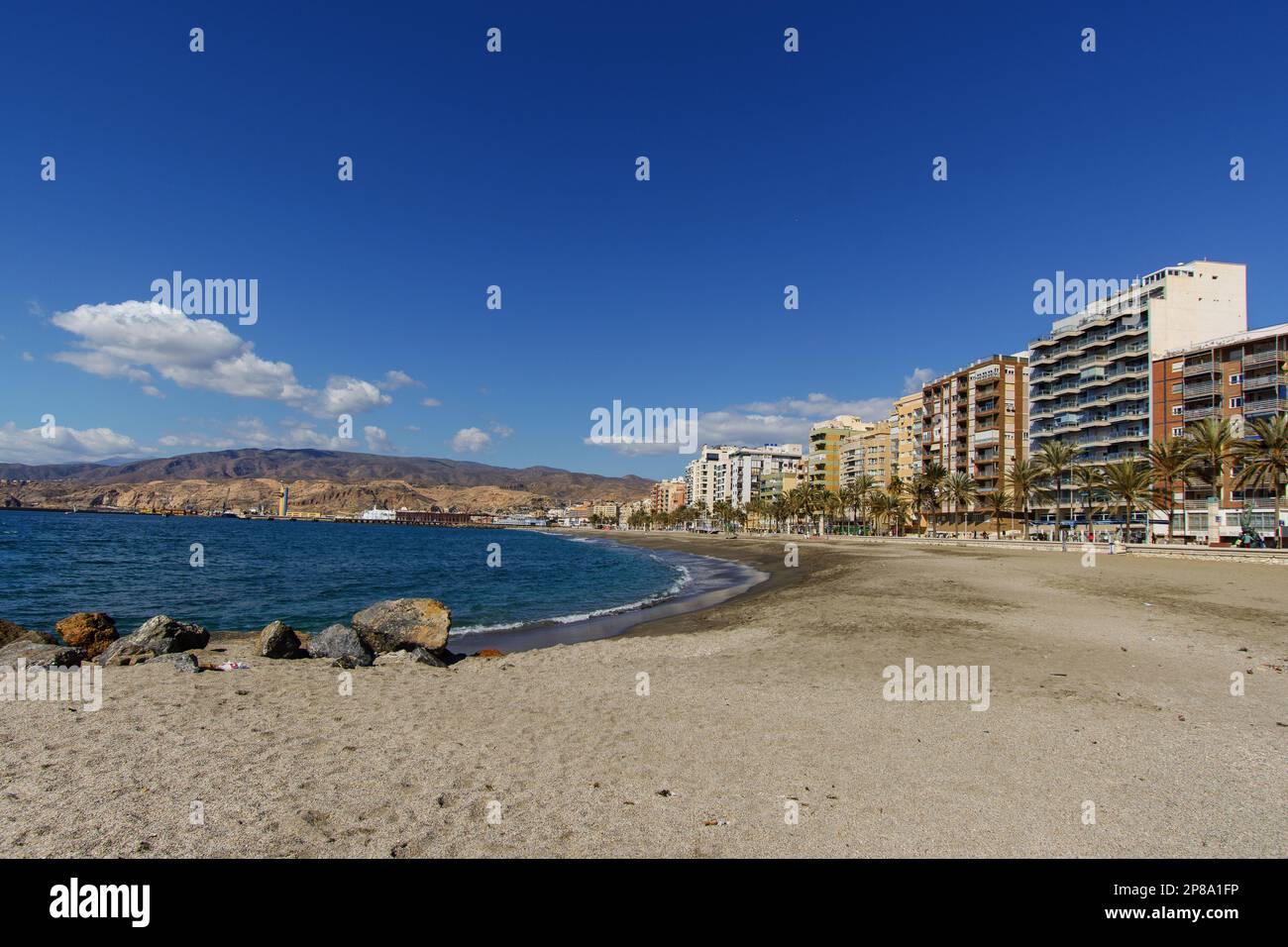 Almería city, Spain. View along sea front looking west towards harbour ...