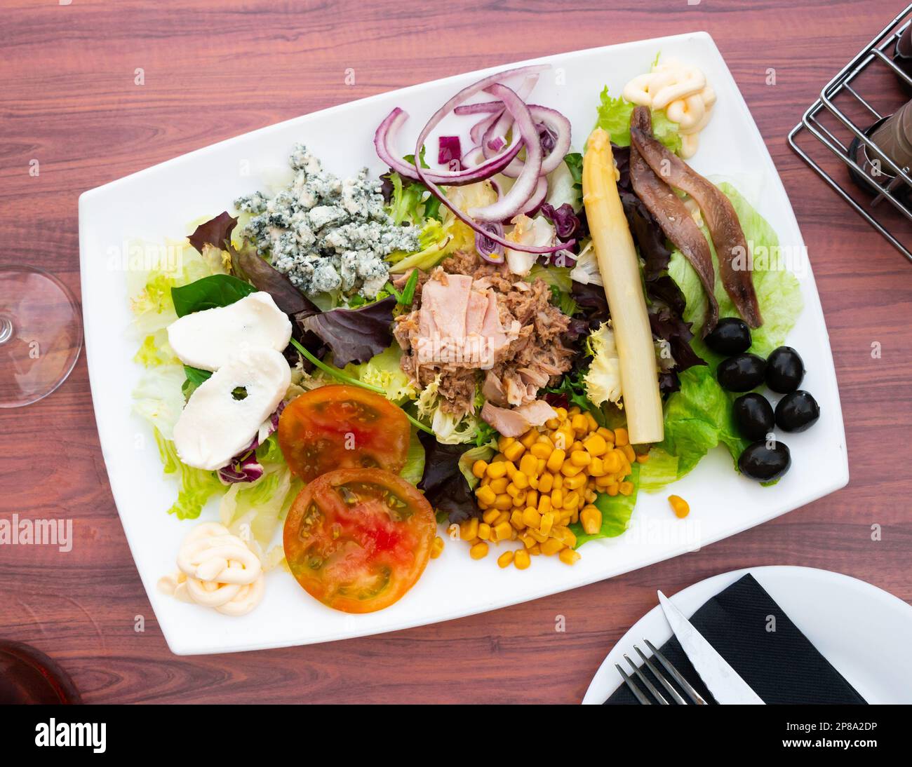 Fresh portion of tuna salad with blue cheese Stock Photo - Alamy