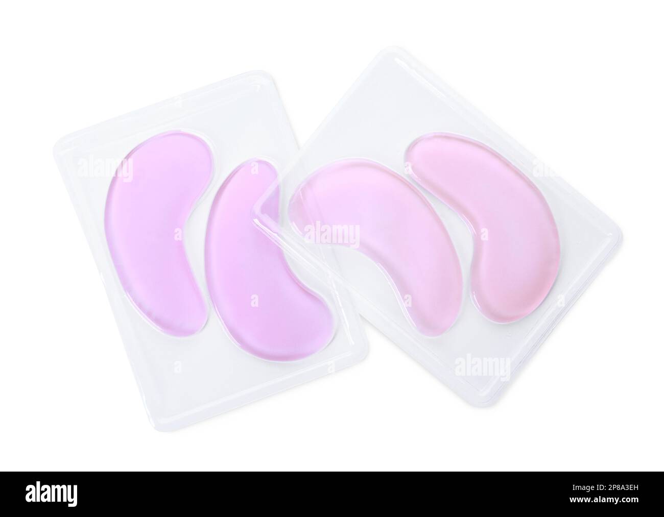 Packages with under eye patches isolated on white, top view. Cosmetic ...