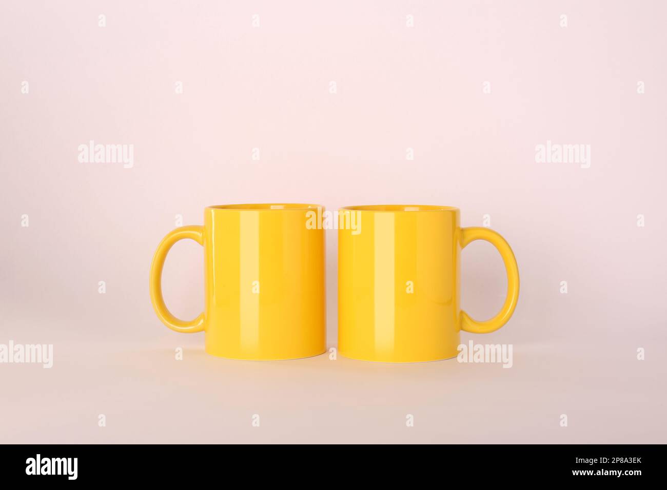 Yellow mugs on light hi-res stock photography and images - Alamy