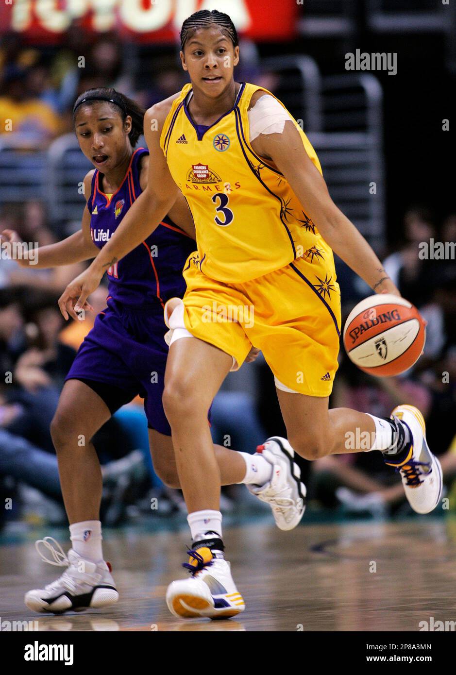 Los Angeles Sparks' Candace Parker (3) brings the ball up court as ...