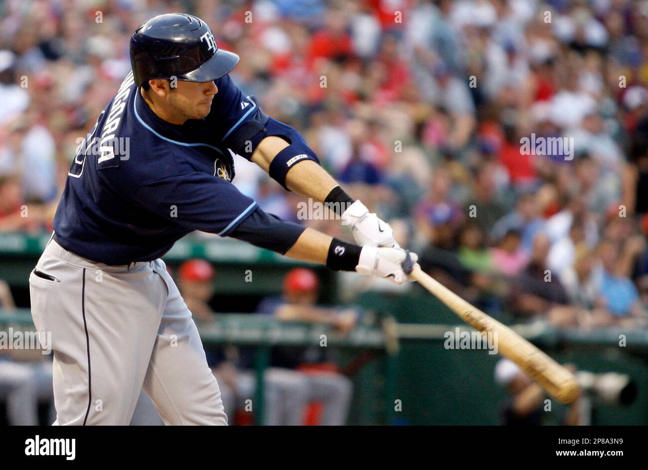 Tampa Bay Rays' Evan Longoria hits a two-run sacrifice fly off Texas ...
