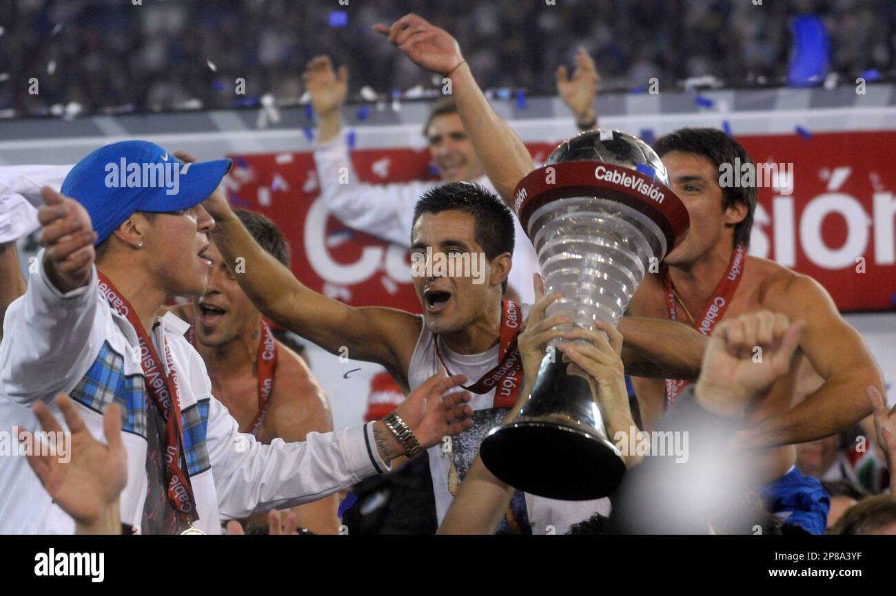 Velez Sarsfield's Maximiliano Moralez, center, celebrates with ...