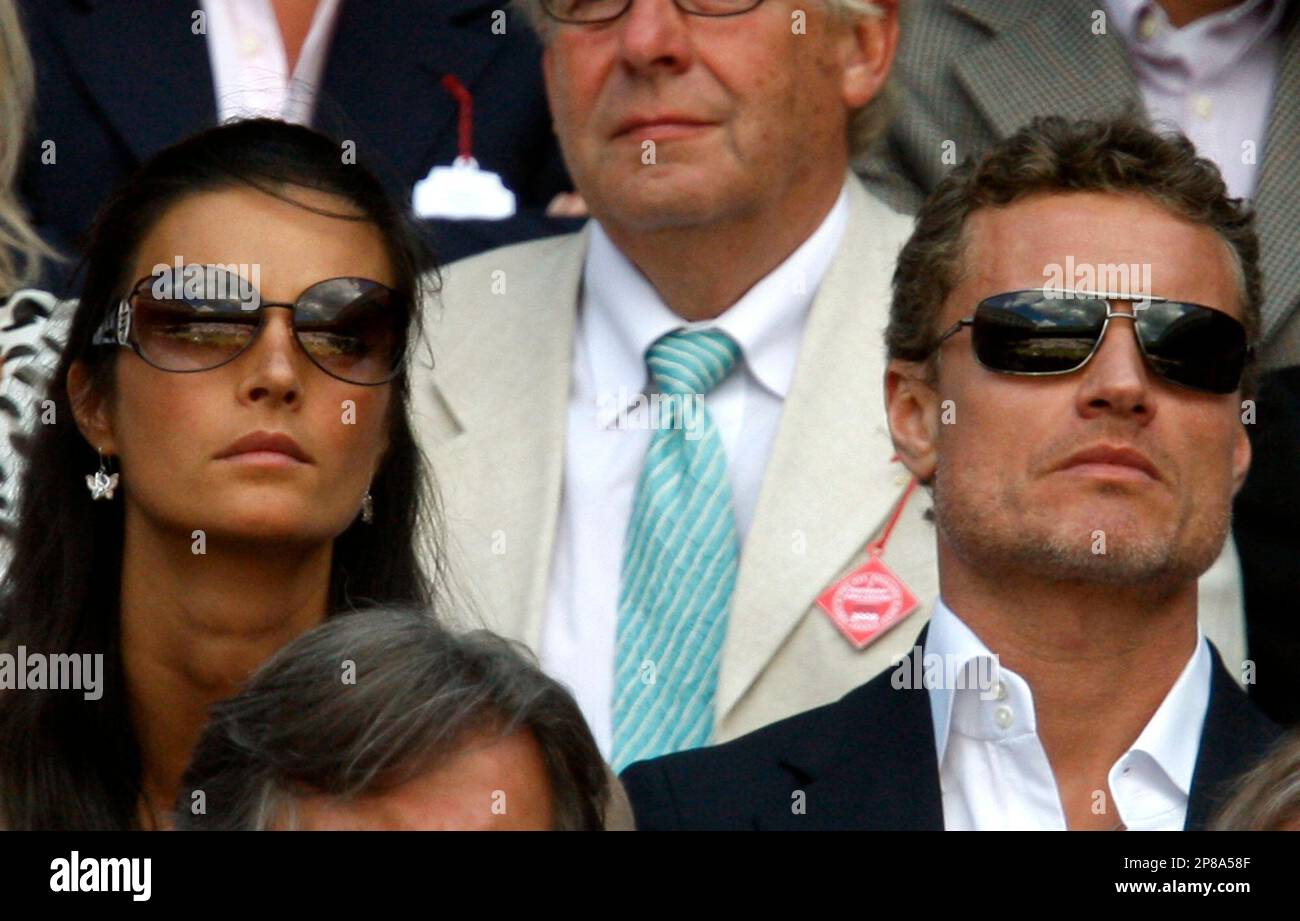 Former formula one racing driver David Coulhard sits with Karen Minier ...
