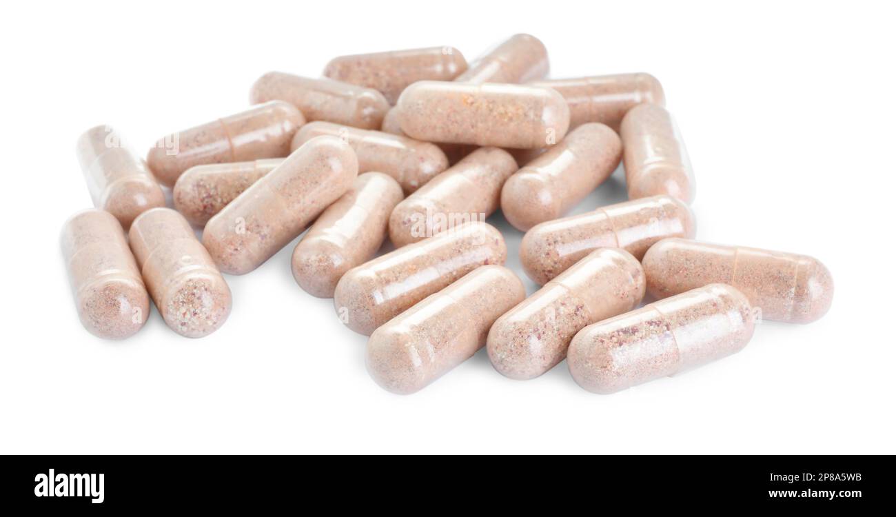 Many transparent gelatin capsules on white background Stock Photo - Alamy