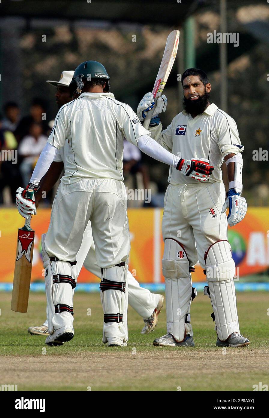 Pakistan's cricketer Mohammad Yousaf, right, acknowledges after ...