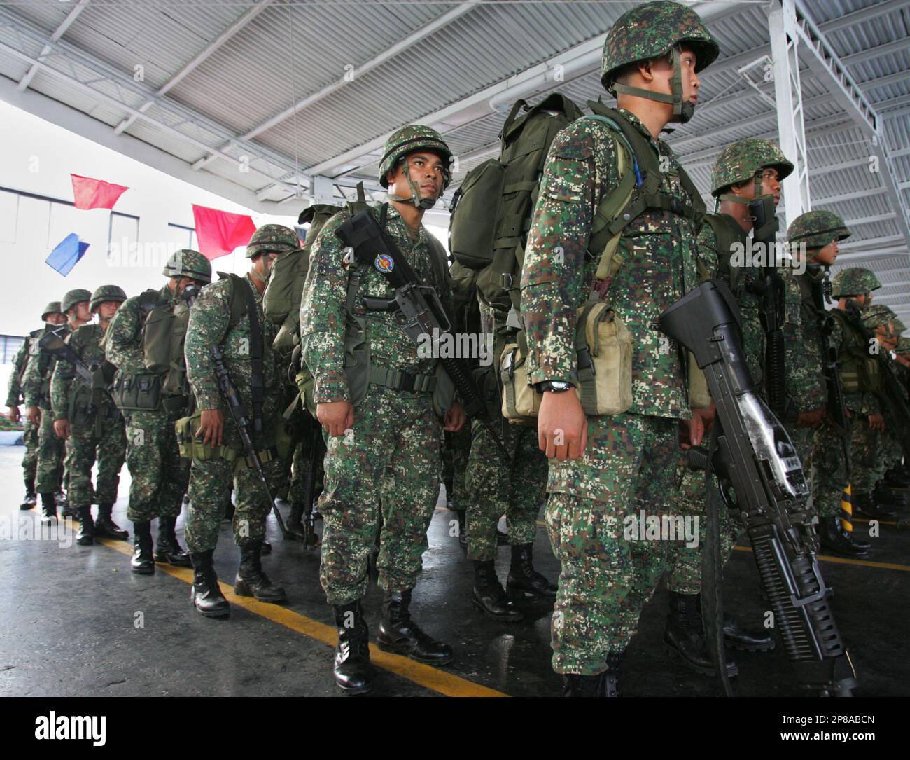 Members Marine Battalion Landing Team-8 stand at attention during the ...