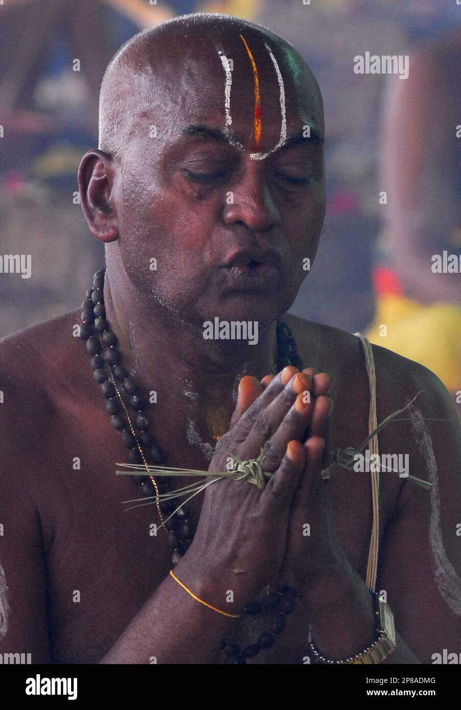 A Hindu priest performs a "Varuna Yagam," a prayer for rains, in ...