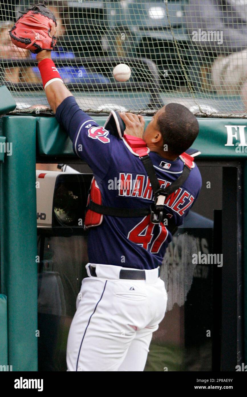 Cleveland Indians catcher Victor Martinez fails to catch a pop foul off ...