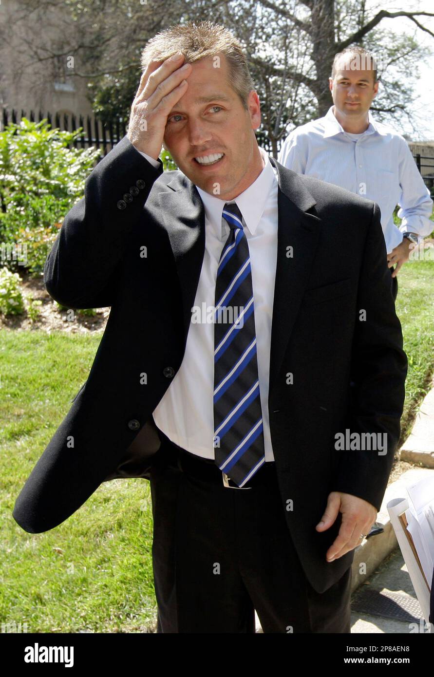 NASCAR driver Jeremy Mayfield wipes his face outside the federal ...