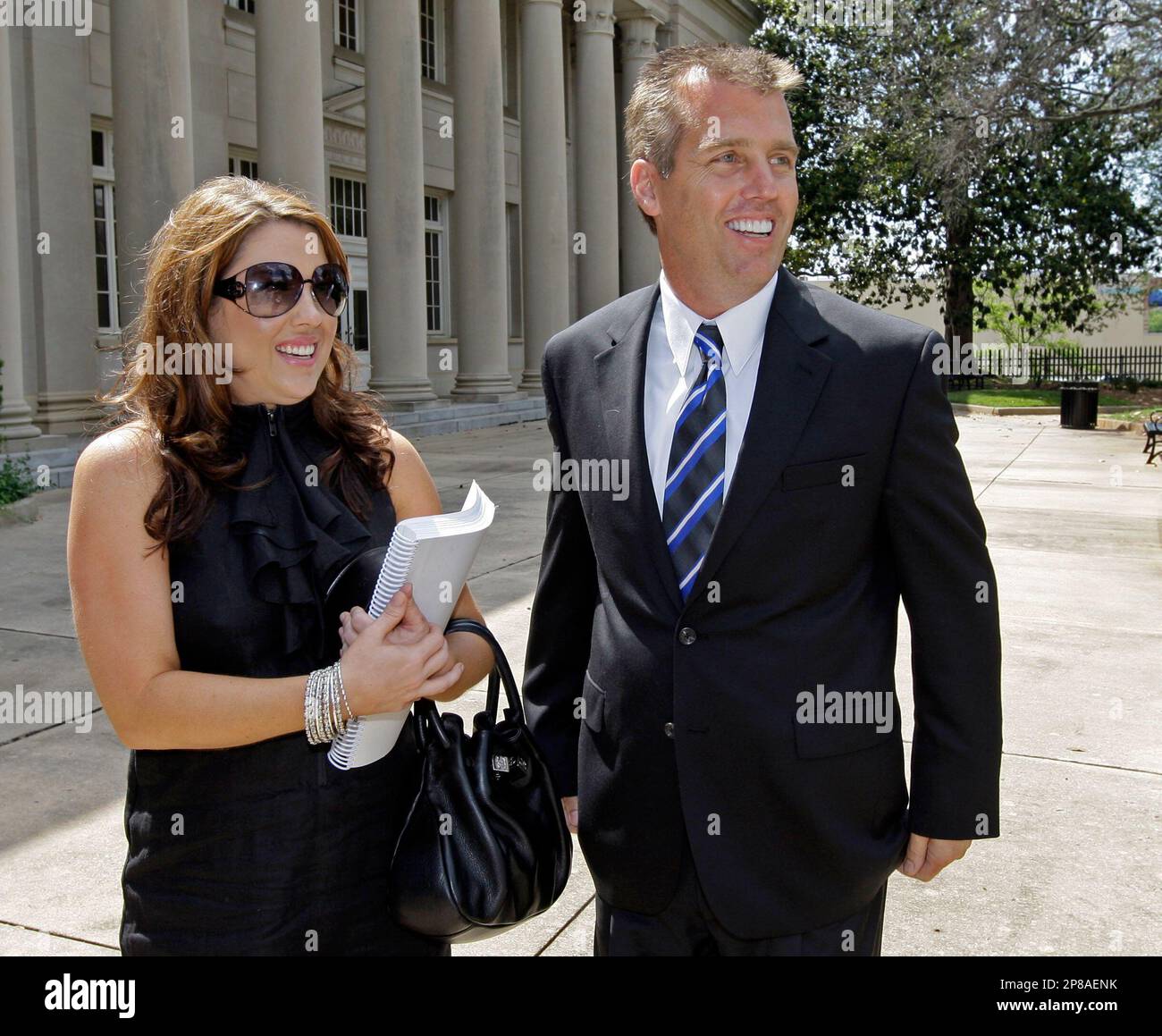 Jeremy Mayfield, right, stands with his wife, Shana, outside the ...