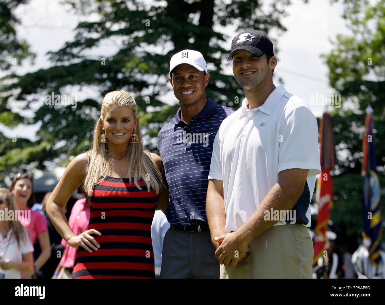 Entertainer Jessica Simpson, left, Tiger Woods, center, and Dallas ...