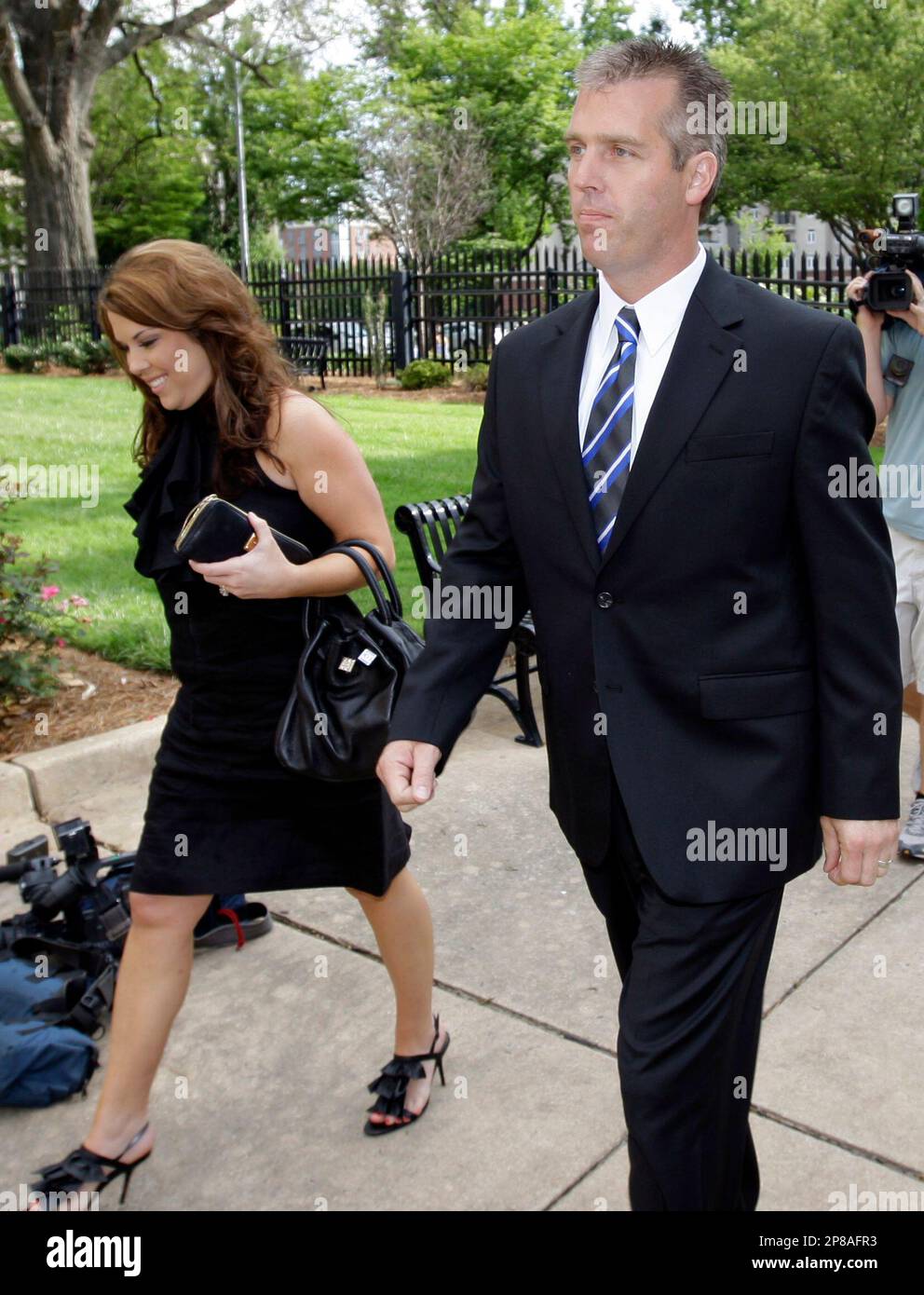 NASCAR driver Jeremy Mayfield, right, and his wife Shana, left, arrive ...