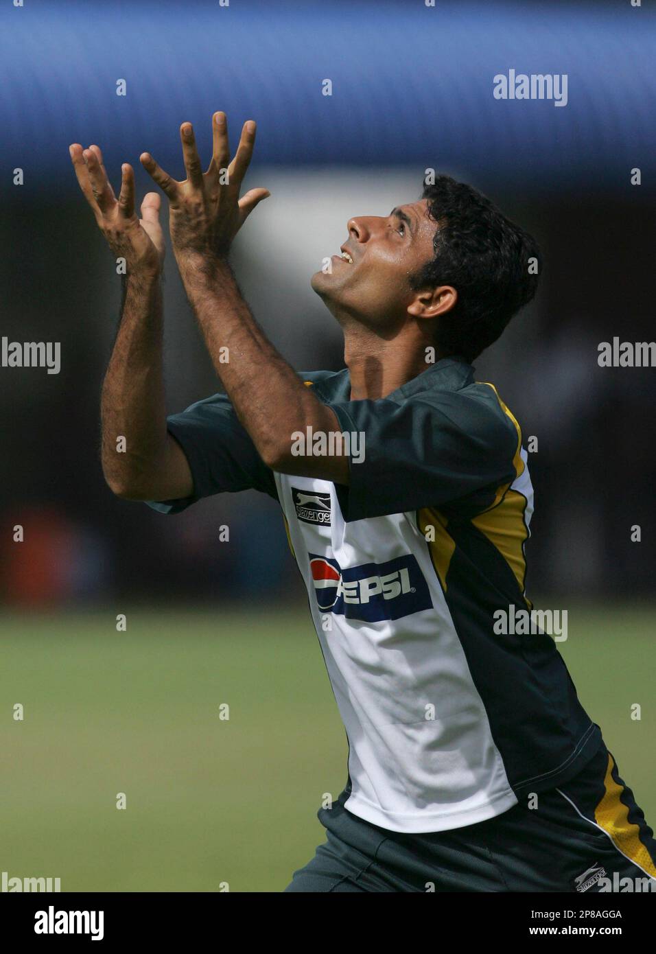Pakistani cricketer Abdul Razzaq reaches to catch a ball during the ...
