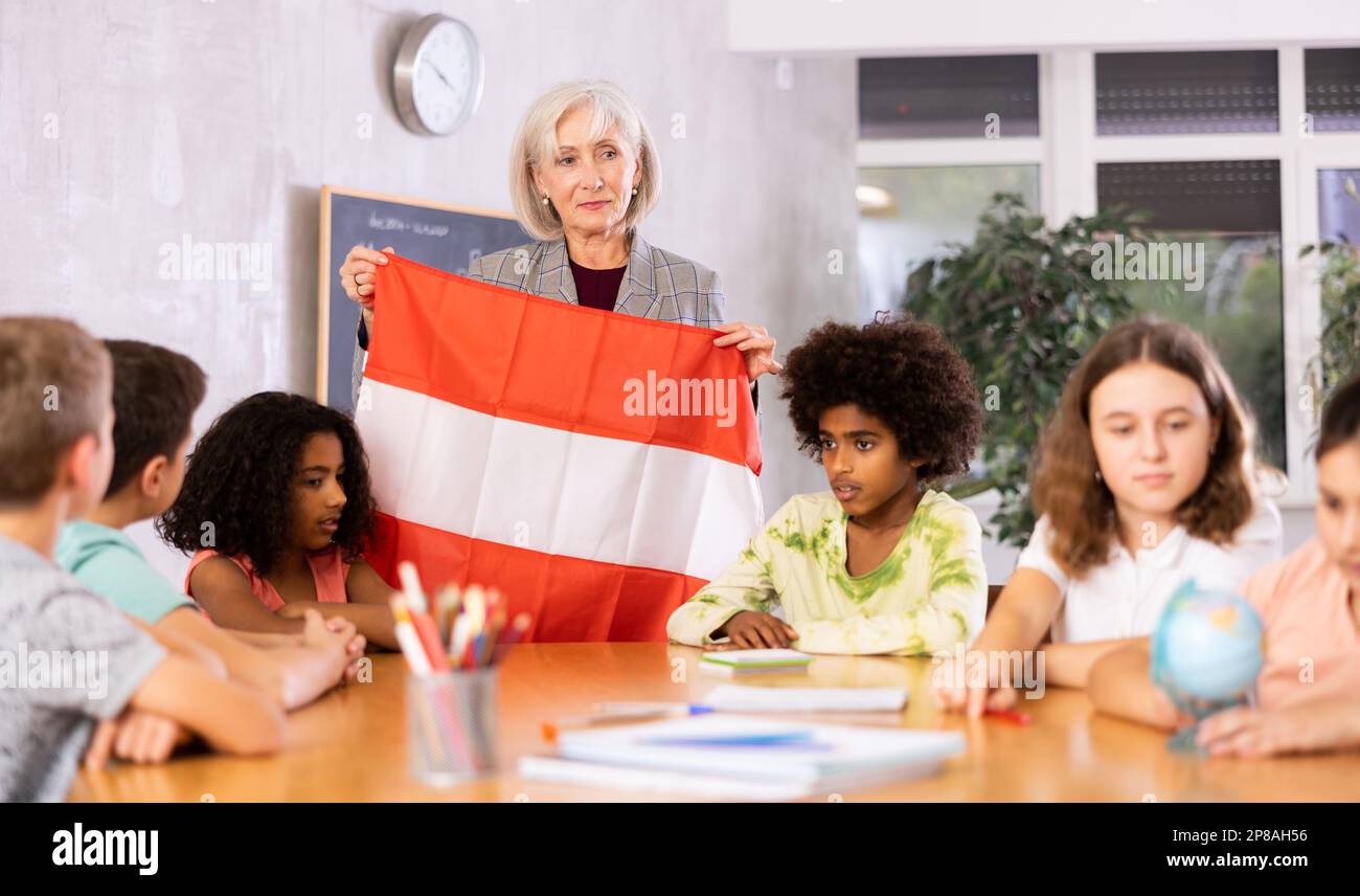 Mature woman teacher tells hi-res stock photography and images - Alamy