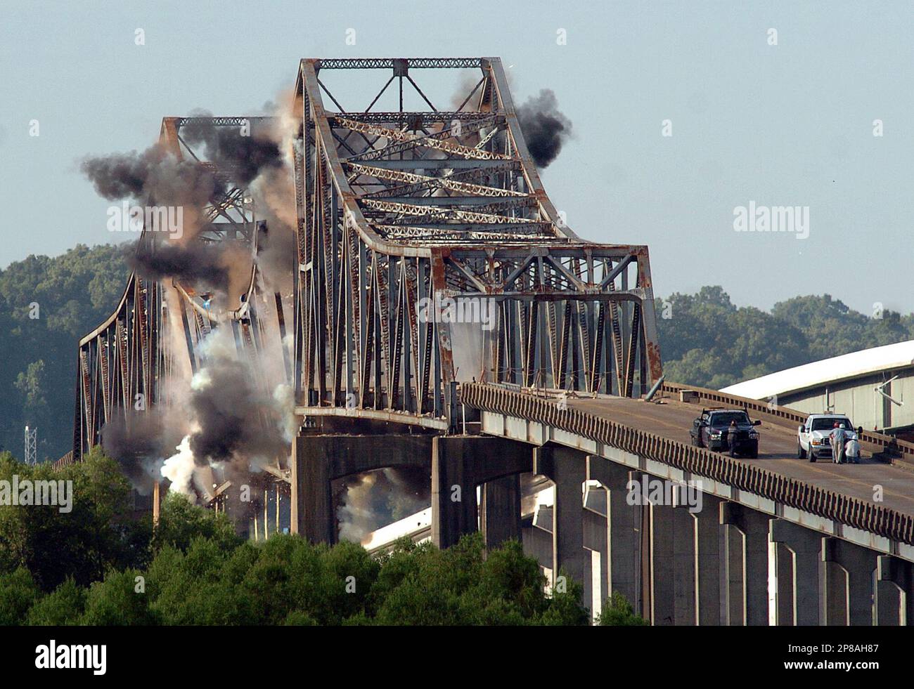 The center span of the 1950 Yazoo River Bridge at Redwood is dynamited ...