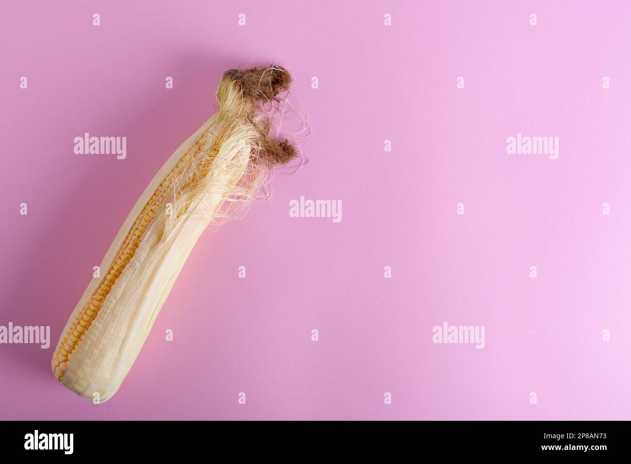 Popcorn falling on blue background hi-res stock photography and images ...