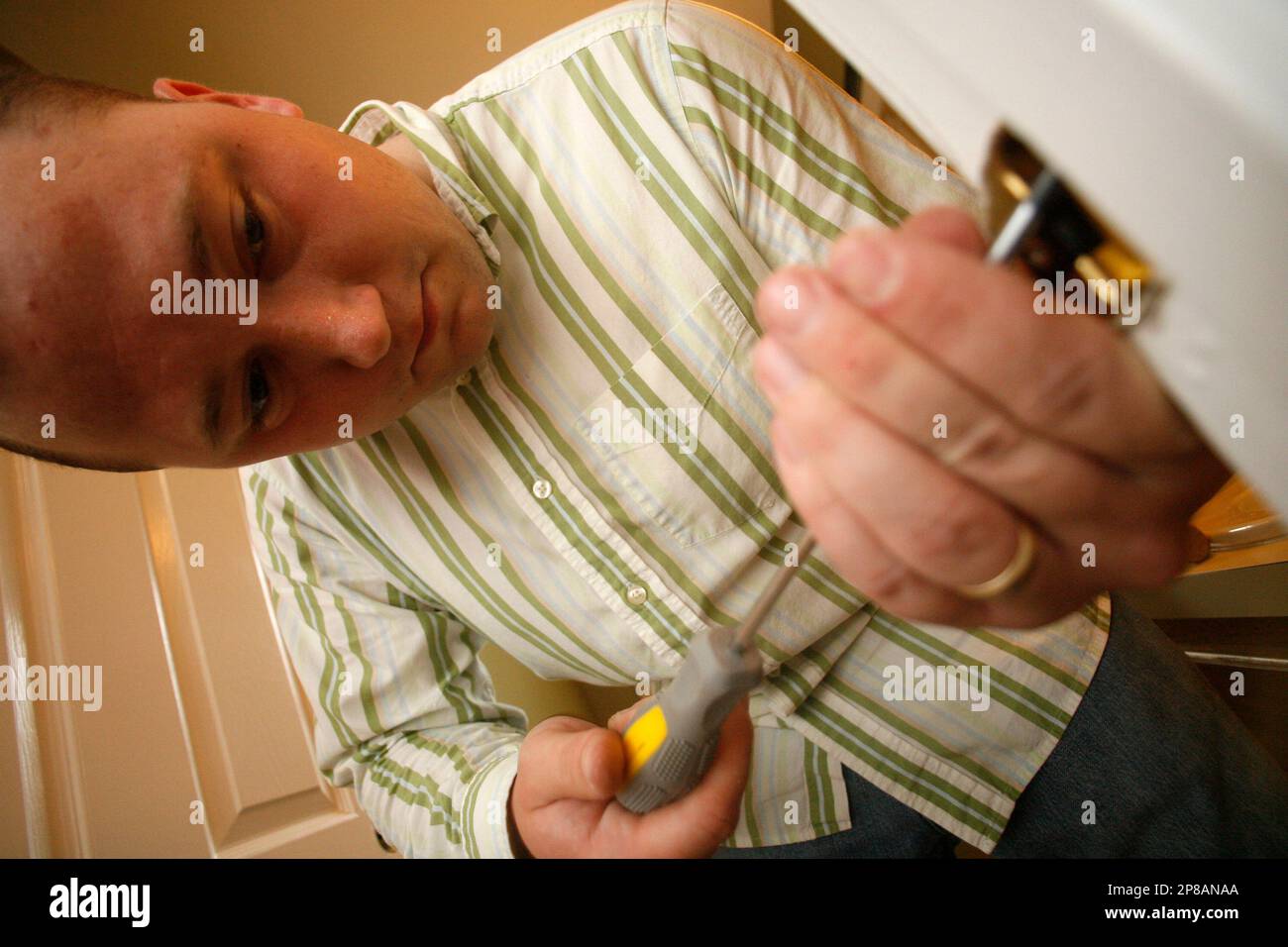 This photo taken June 6, 2009 shows Cory von Wallenstein attaching a ...