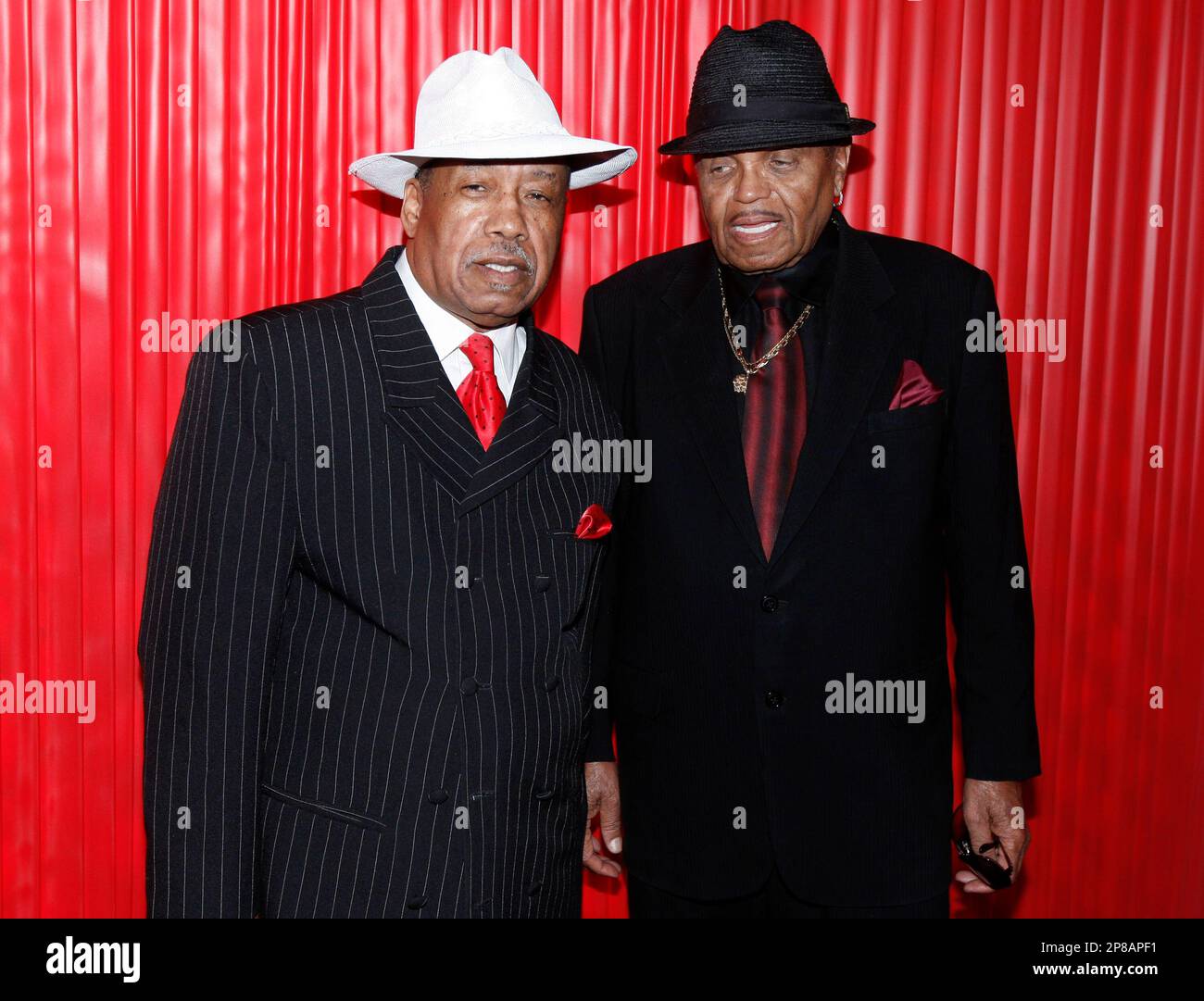 Joe Jackson, right, father of the late pop star Michael Jackson, and ...