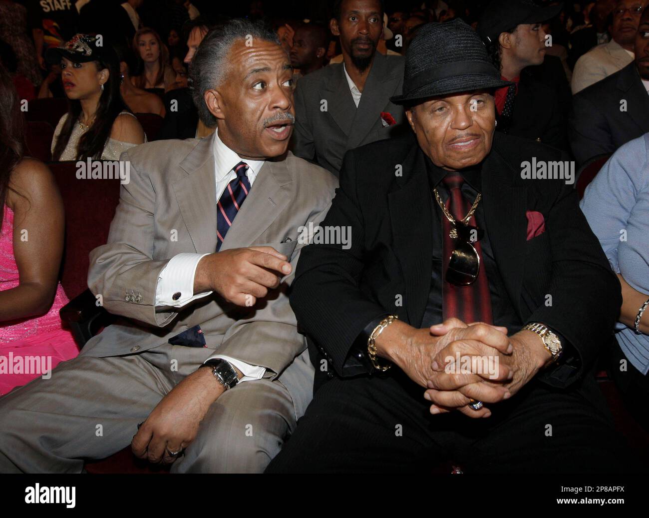 Joe Jackson, right, father of the late pop star Michael Jackson, and ...