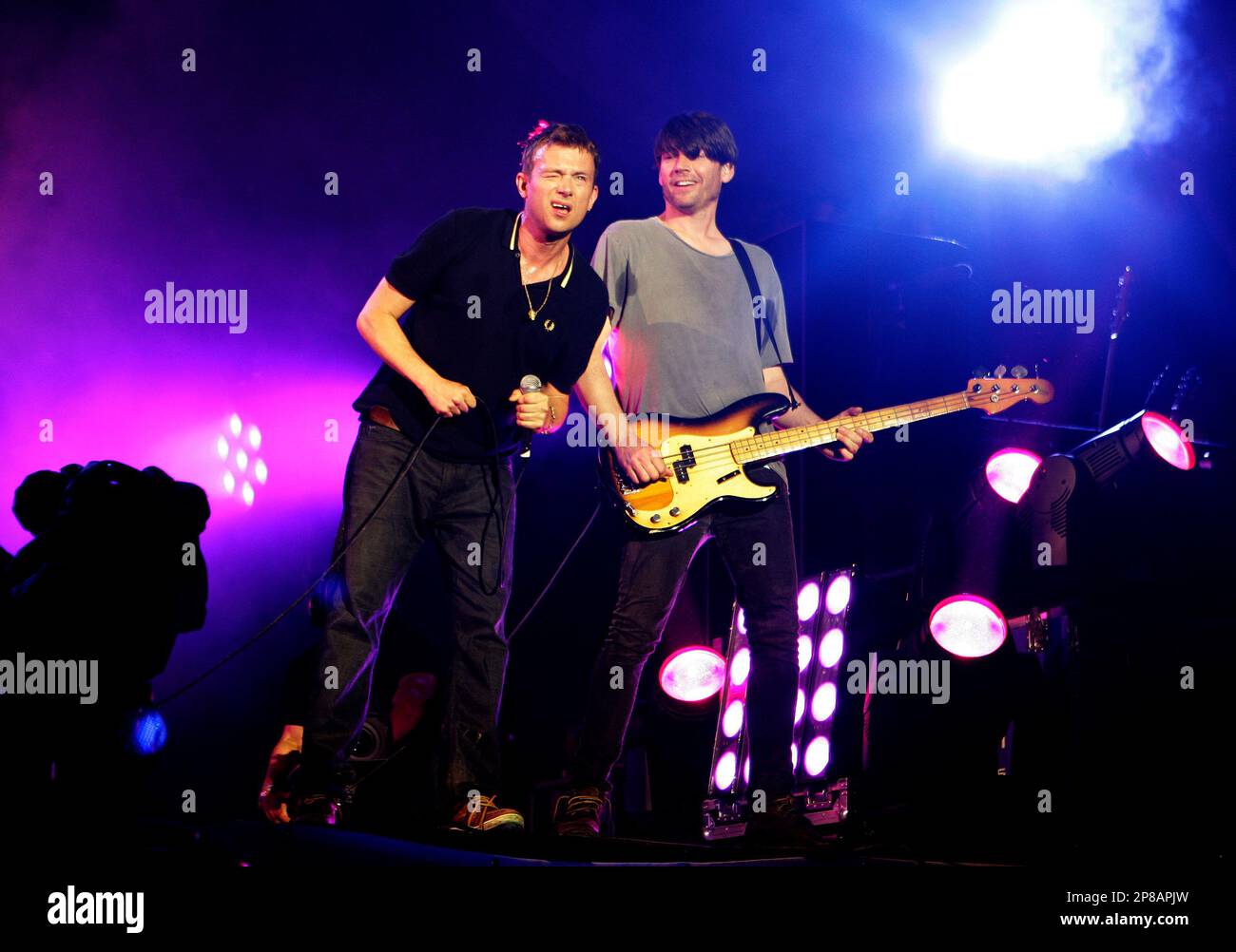 Damon Albarn, lead singer of British band Blur, left, performs with ...