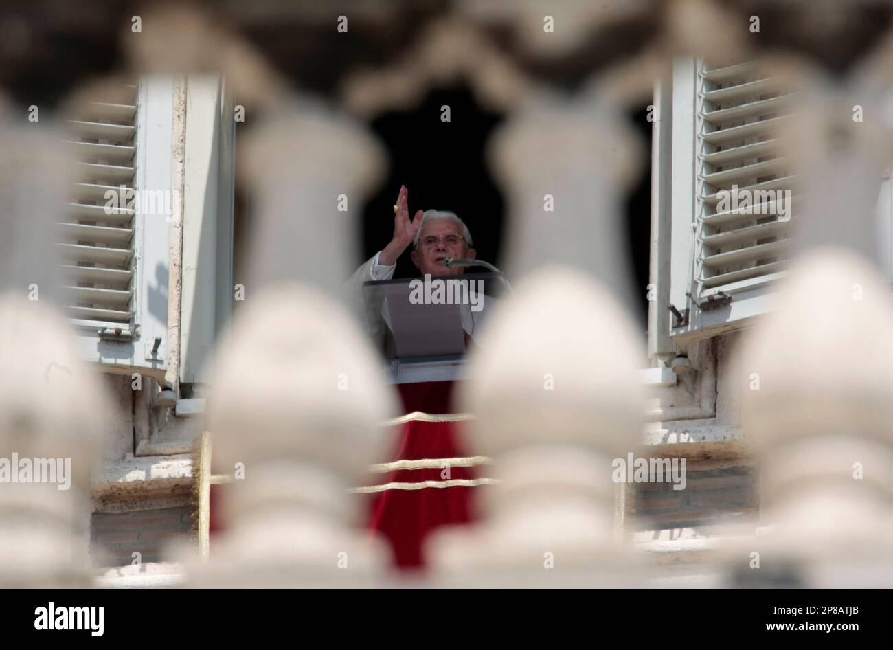 Pope Benedict XVI delivers his blessing during the Angelus noon prayer ...